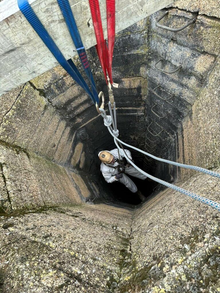 Inspection of a chimney from the 1960s on a shutdown site in context of ...
